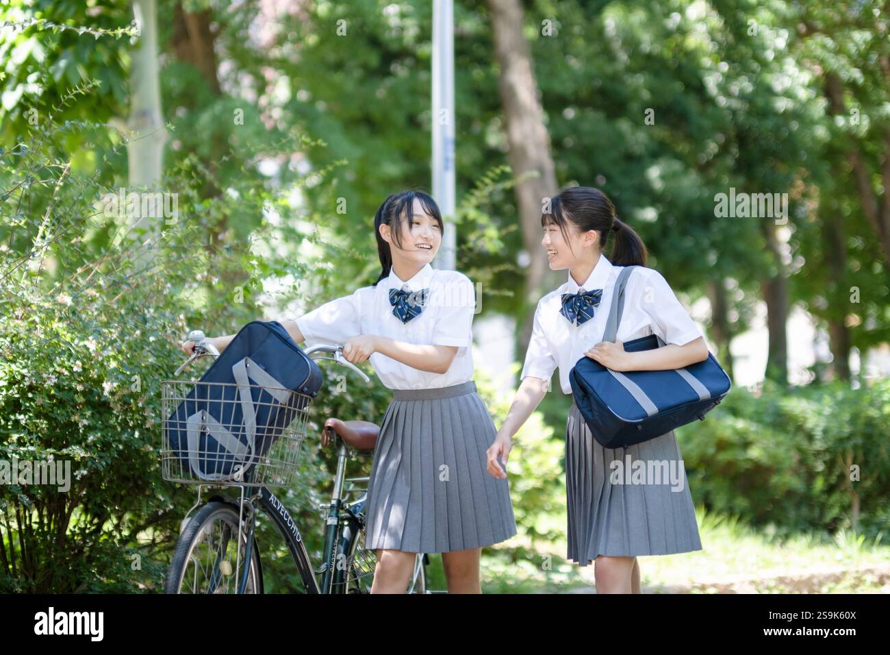 Student commuting to school Stock Photo - Alamy