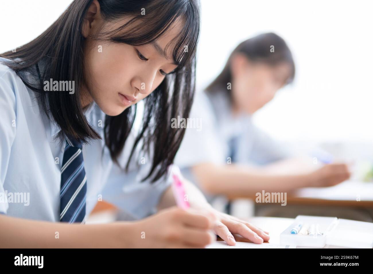 Student in class Stock Photo - Alamy