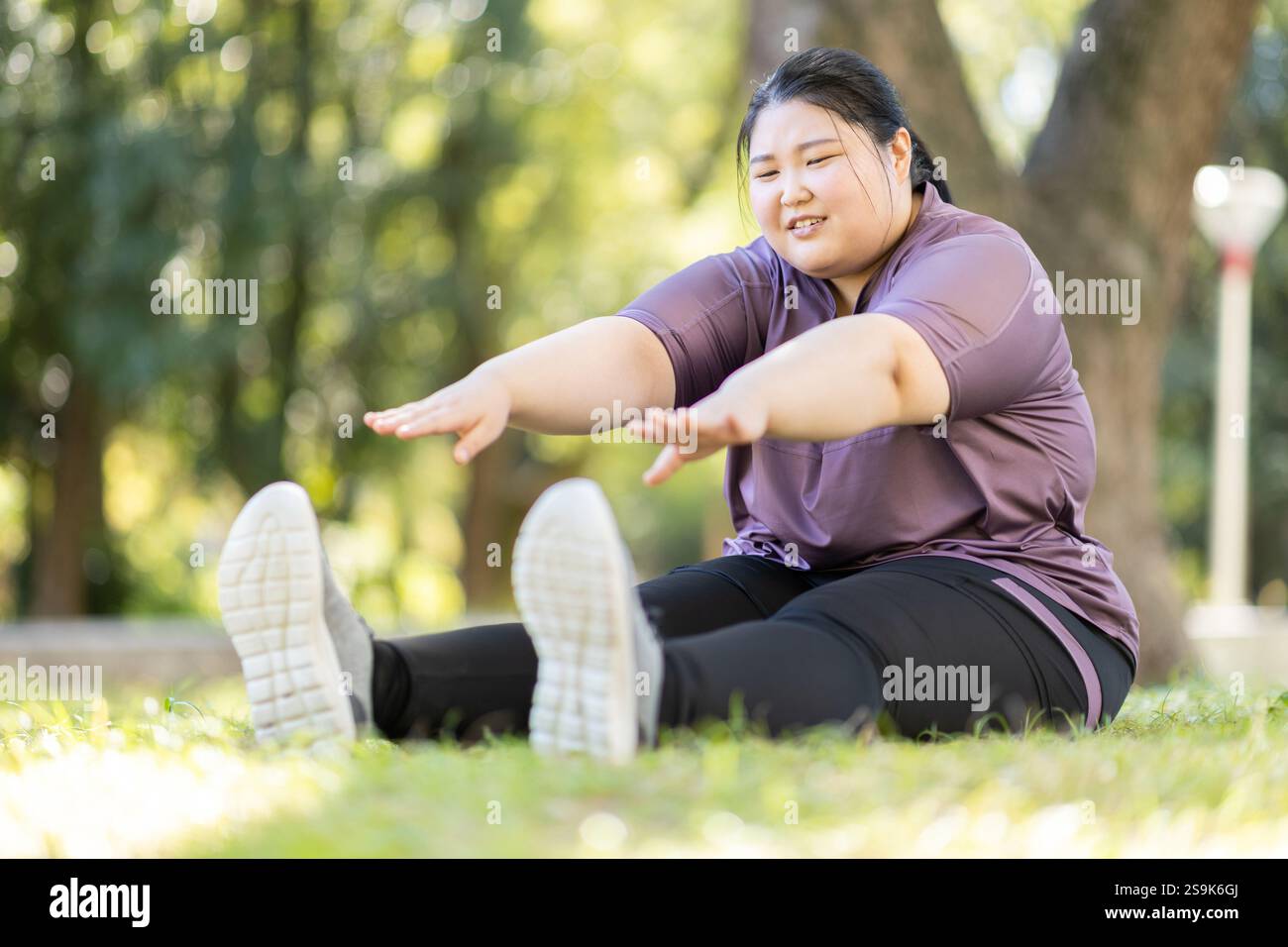 Fat women bending hi-res stock photography and images - Alamy