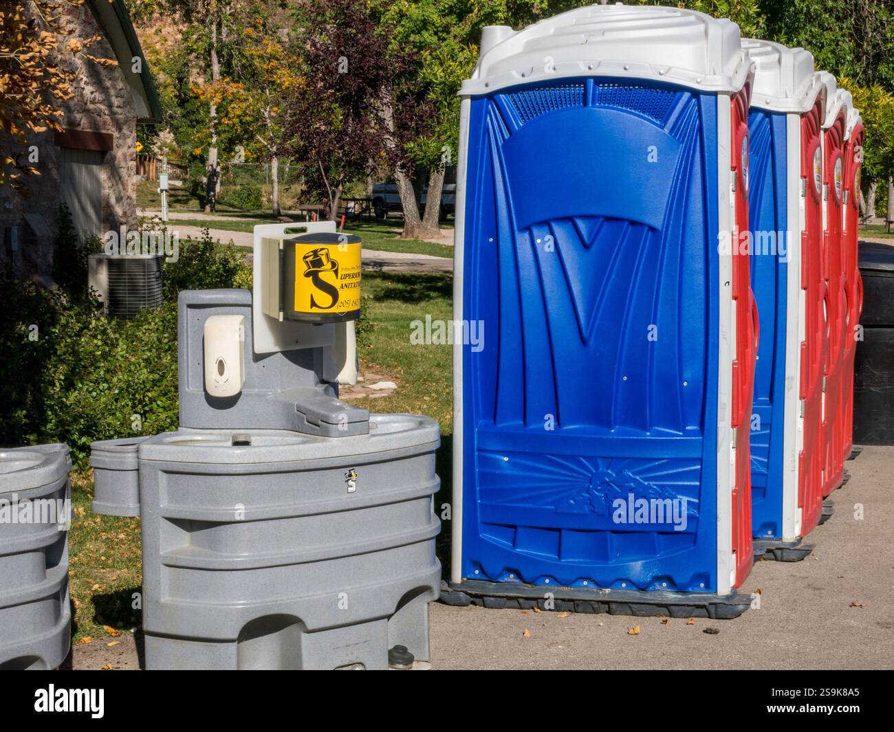 Colorful portable toilets and Hand Washing Tub, USA Stock Photo - Alamy