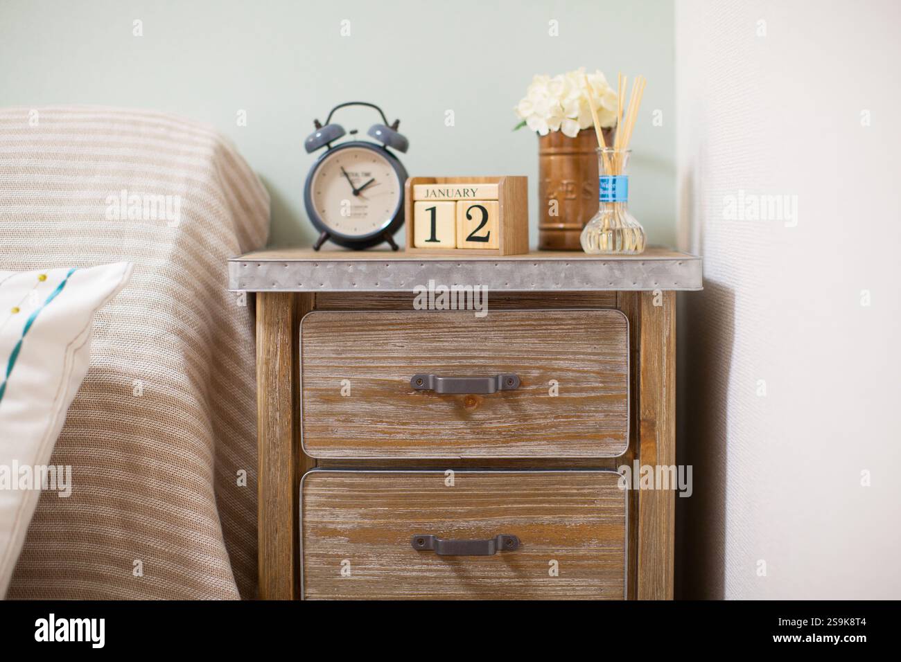 Interior with alarm clock Stock Photo - Alamy