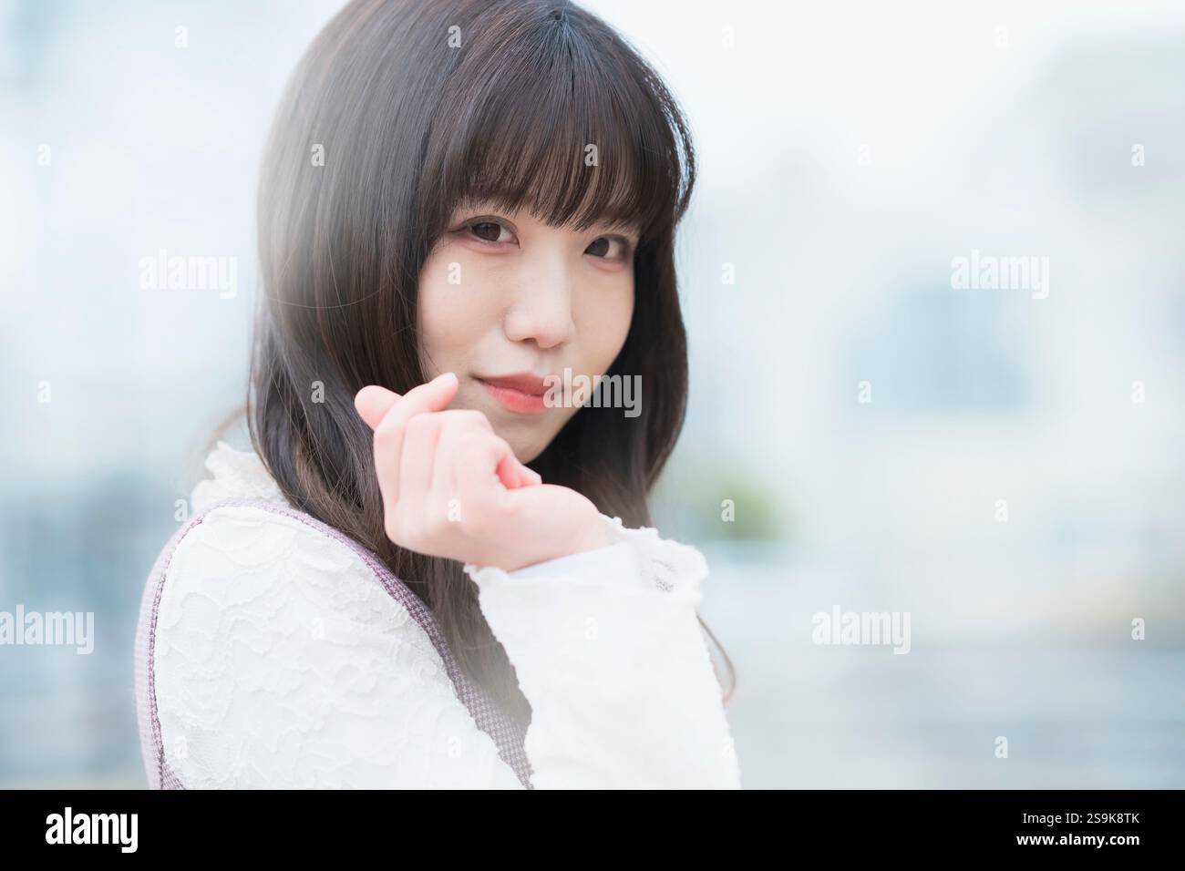 Woman finger pose symbol hi-res stock photography and images - Alamy