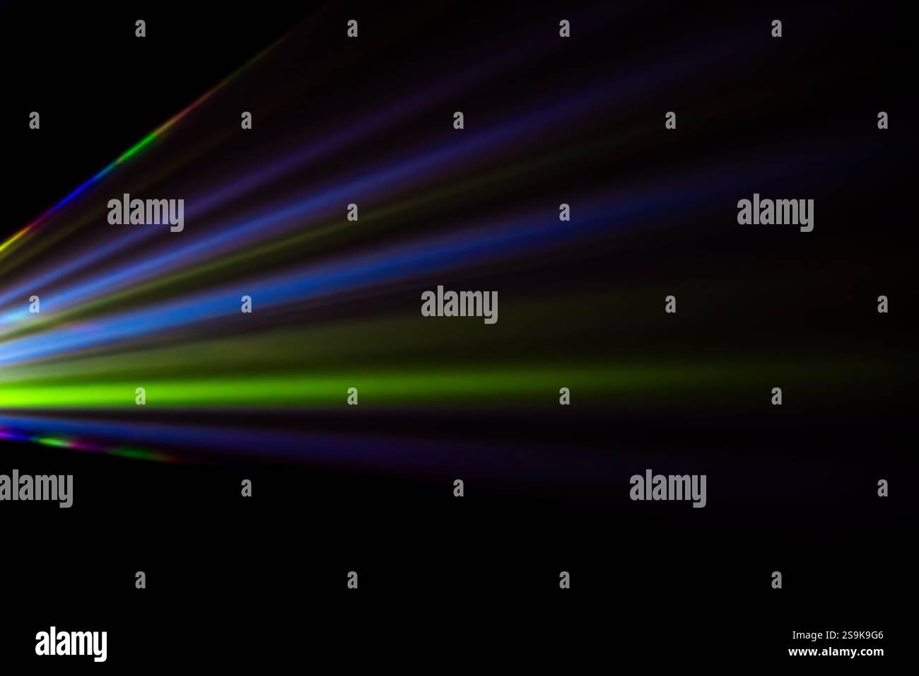 colored light beams from reflector through the foggy night sky Stock ...