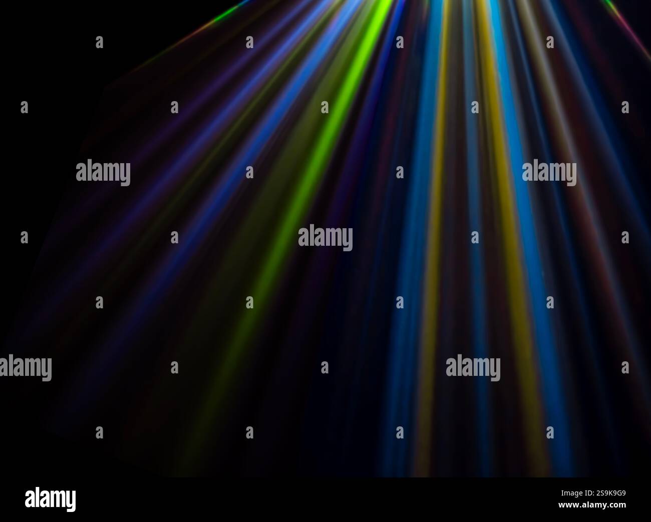 colored light beams from reflector through the foggy night sky Stock ...