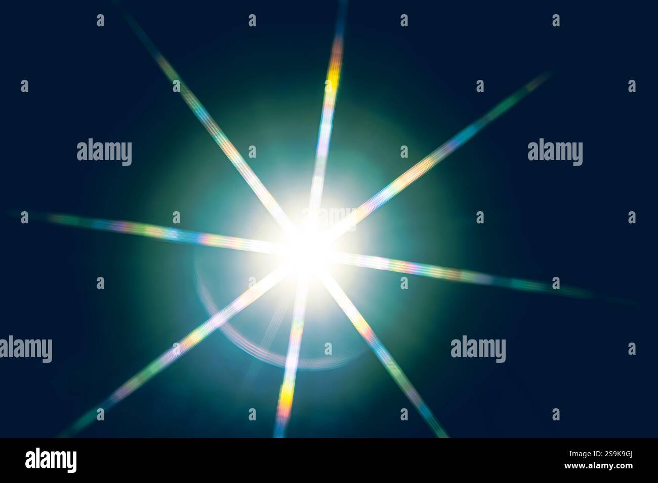 colorful flashy spotlight star made with optical star filter on camera ...