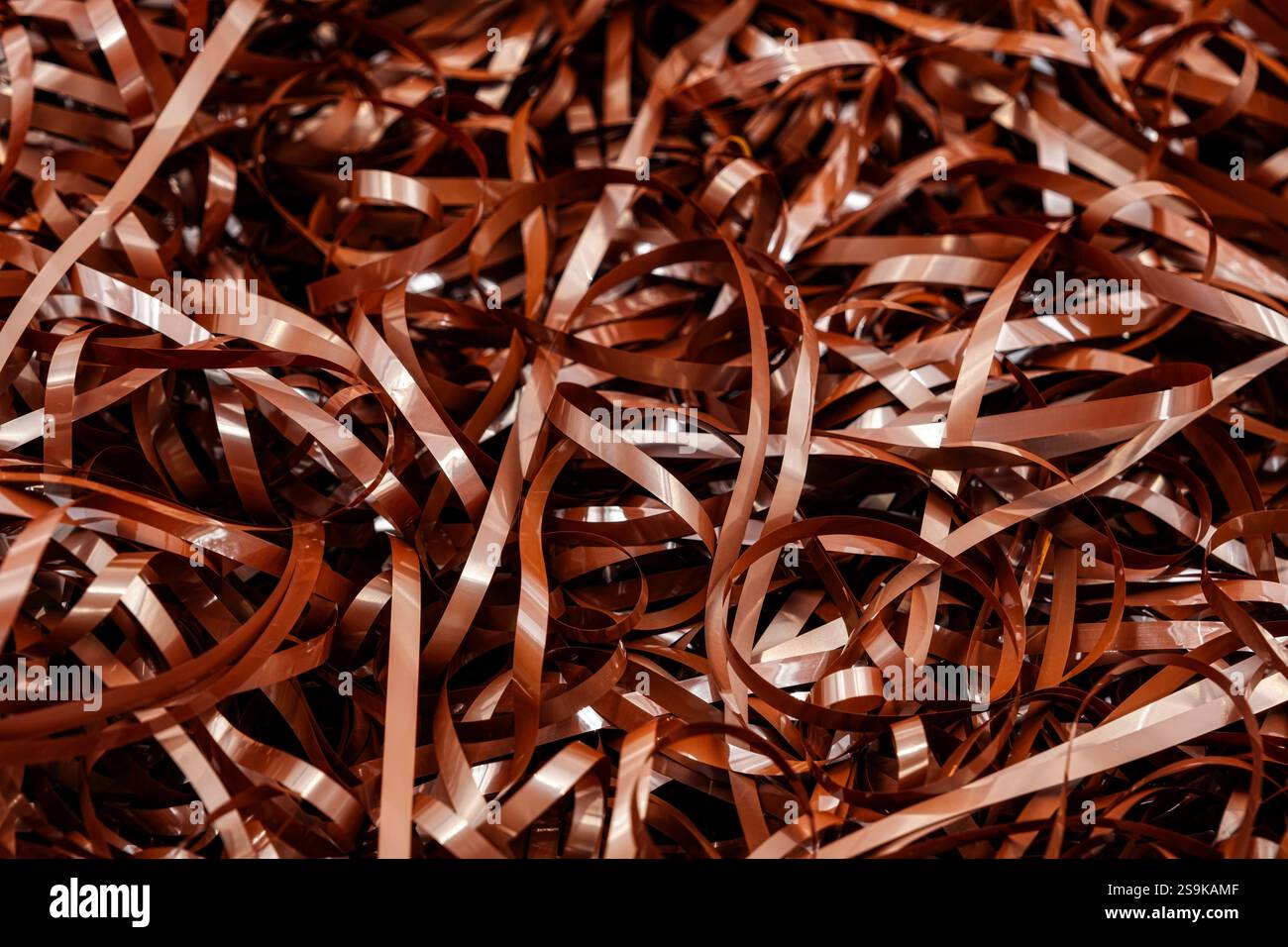 Magnetic tape unwound, magnetic audio cassette tangle, evoking ...