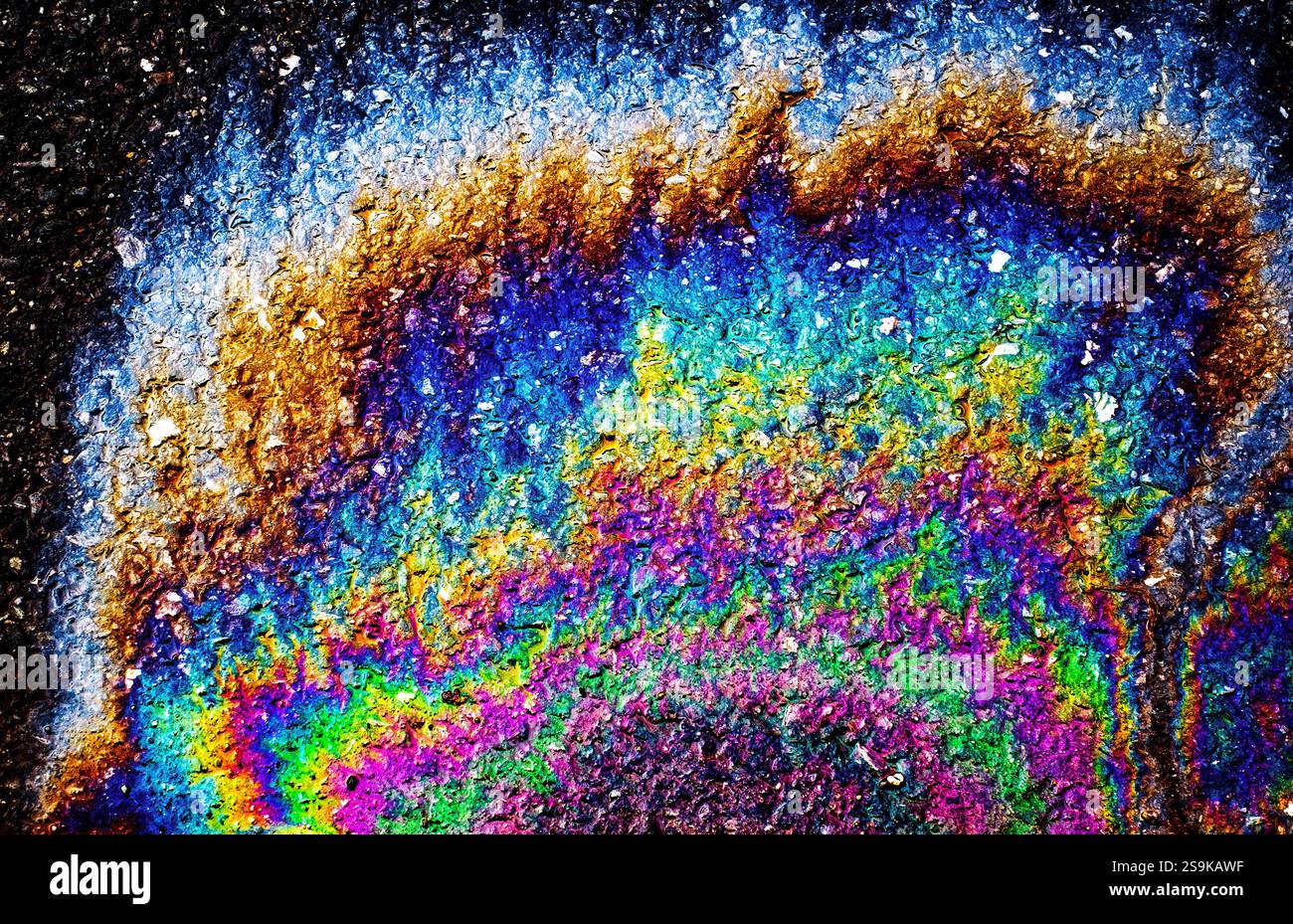 Oil stain on Asphalt road after rain, color Gasoline fuel spots on ...