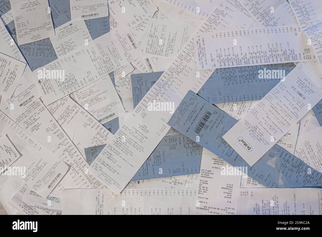 Sibiu, Romania - November 12, 2024. Romanian shopping receipt stacks ...