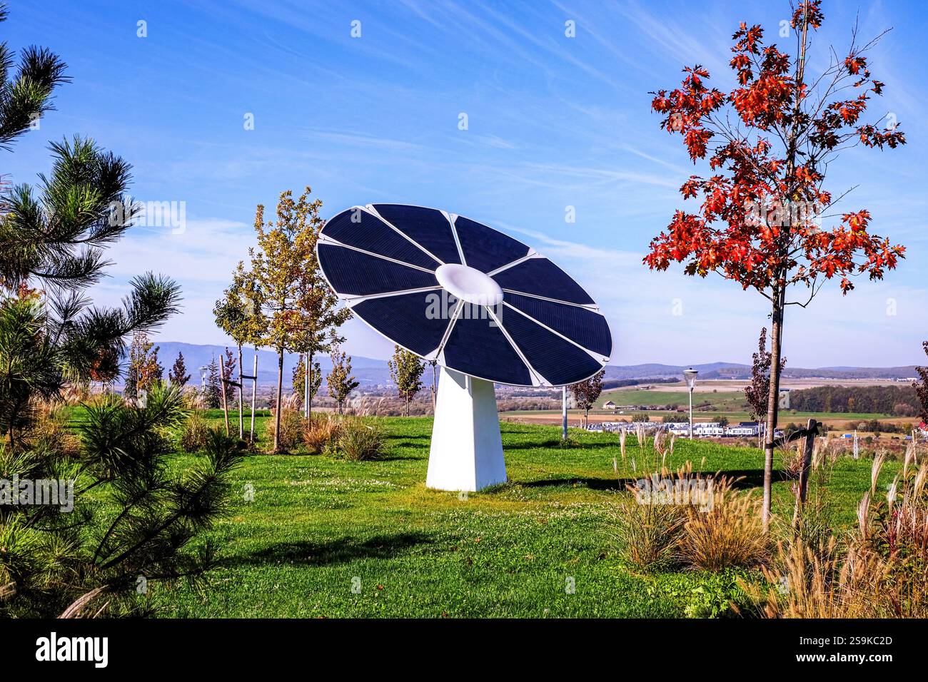 Rotating solar panel in flower shape in city park. Photovoltaic ...