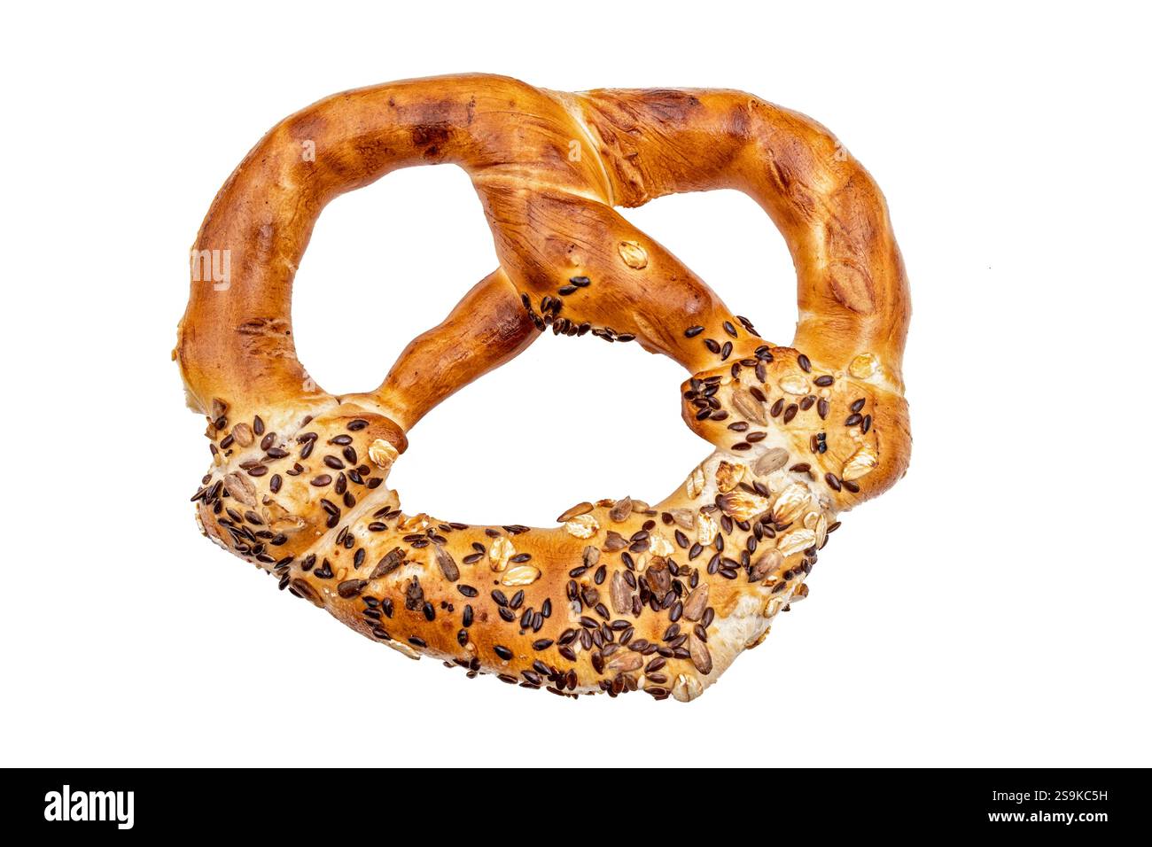 Twisted pretzel braided with various seeds, traditional snack in ...
