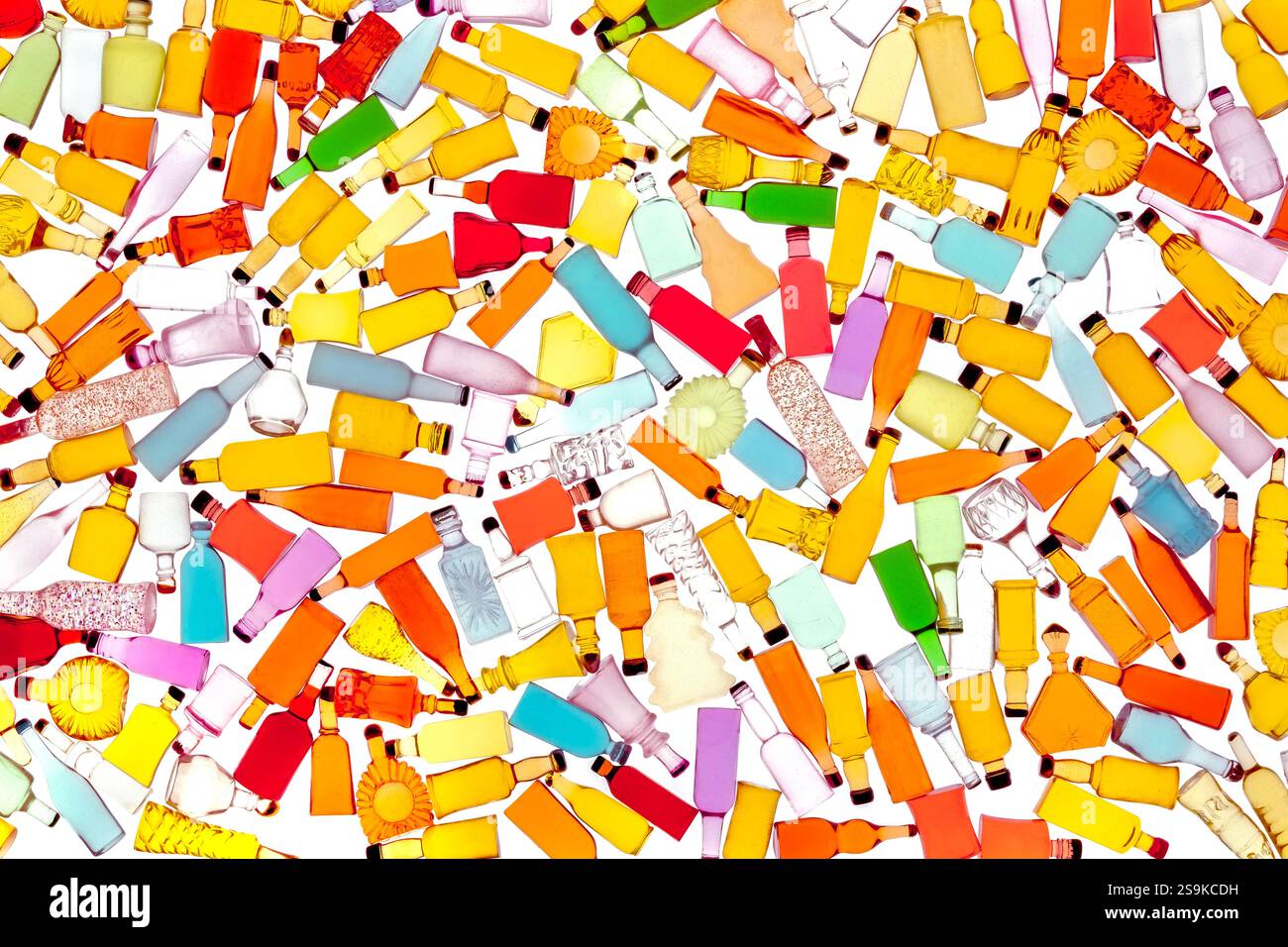 various miniature bottles of alcohol without labels with the back light ...