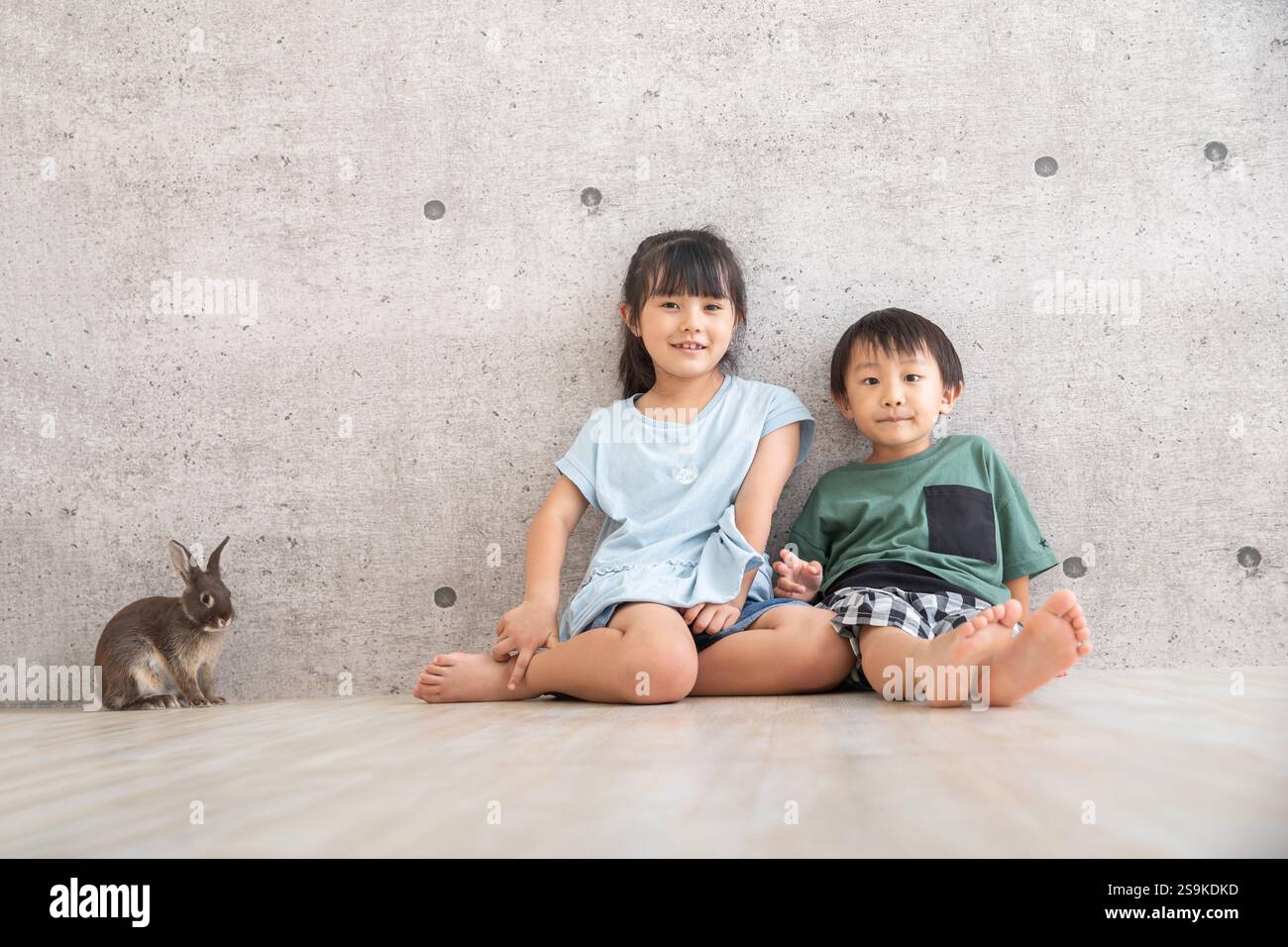 Rabbit and child Stock Photo - Alamy