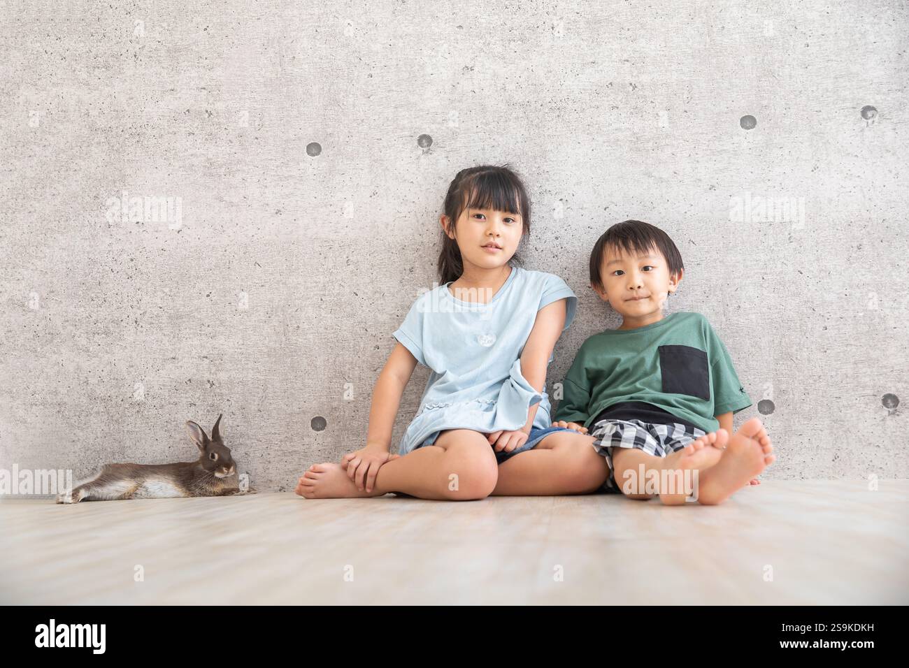 Rabbit and child Stock Photo - Alamy