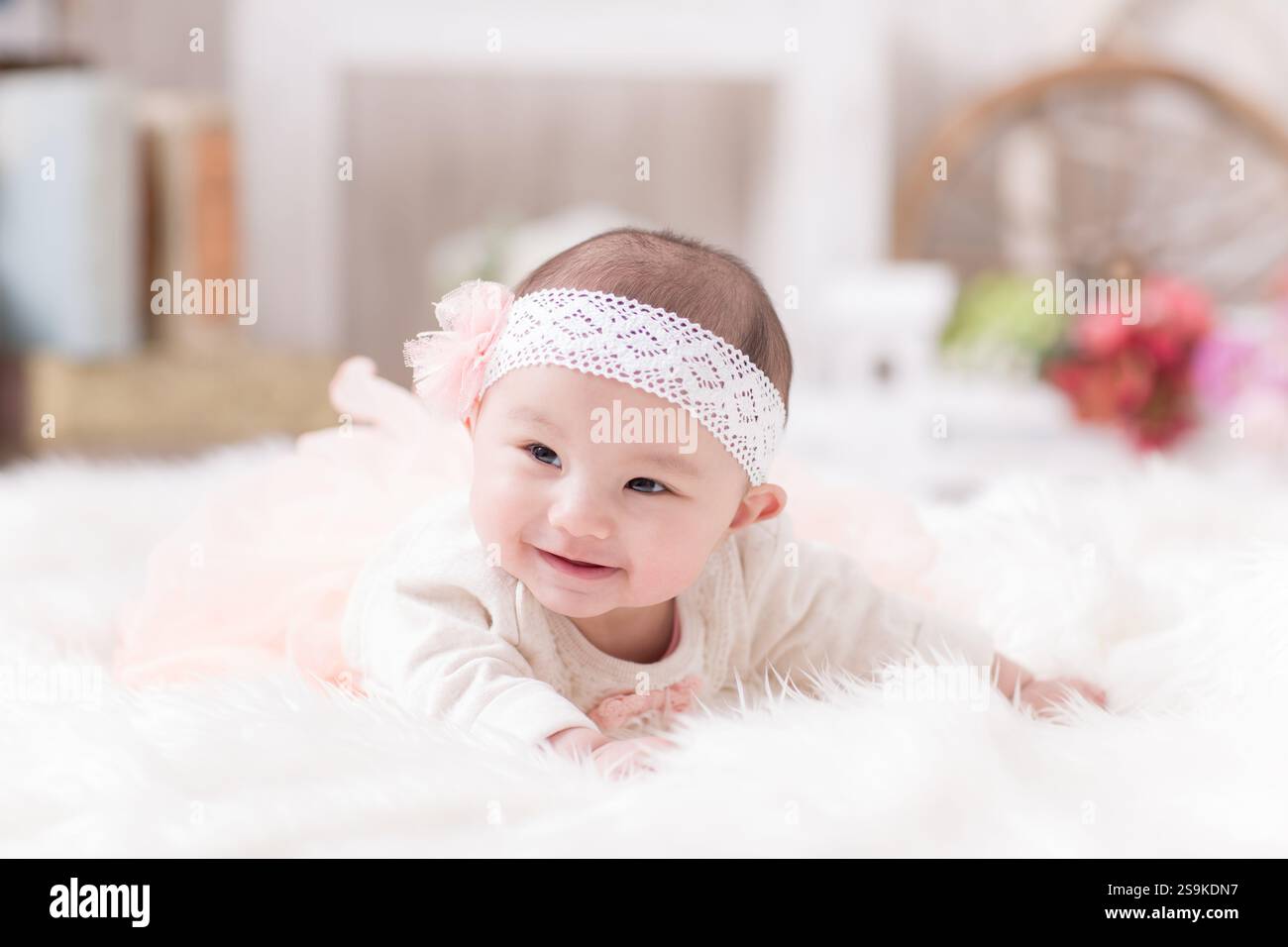 Six-month-old baby in baby dress, dress Stock Photo - Alamy