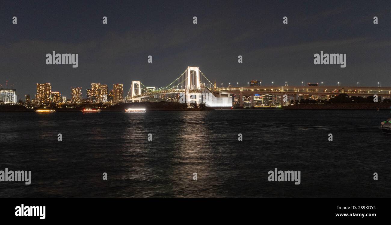 December 21, 2024. Tokyo Rainbow Bridge At Night Stock Photo - Alamy