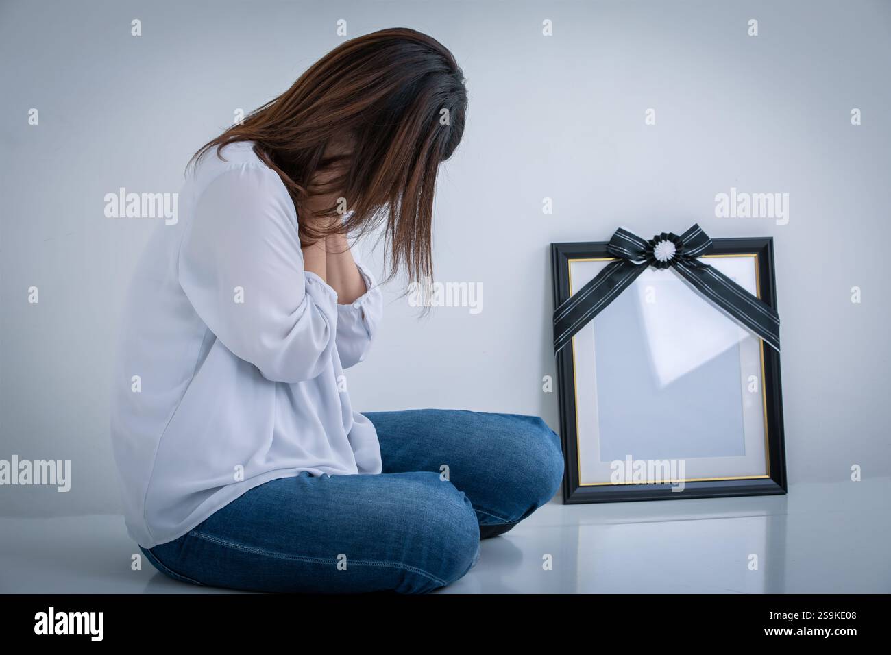 Woman in tears after losing a loved one Stock Photo - Alamy