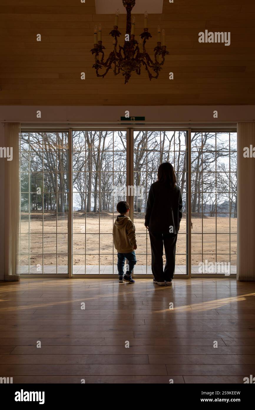 Parent and child Back view Stock Photo - Alamy