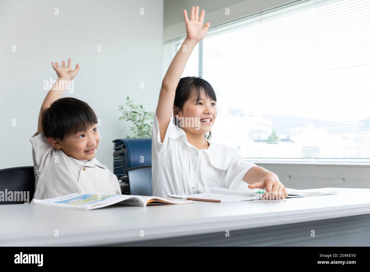 Primary schools student in class Stock Photo - Alamy