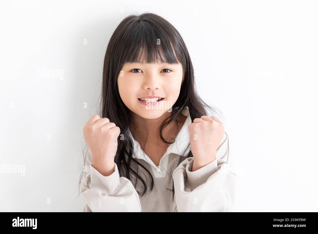 Child striking a Guts Pose Stock Photo - Alamy