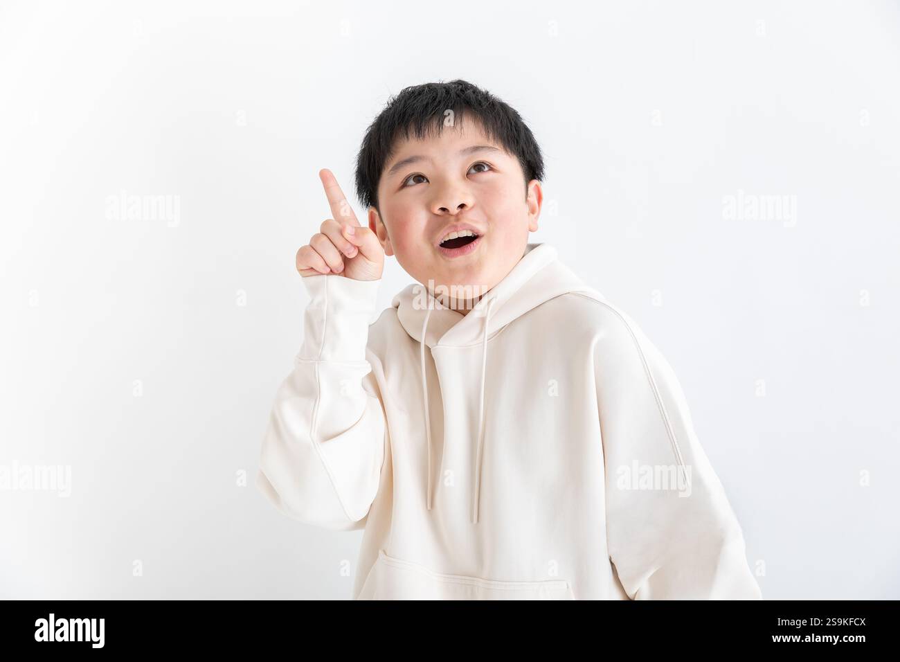 Boy in inspirational pose Stock Photo - Alamy