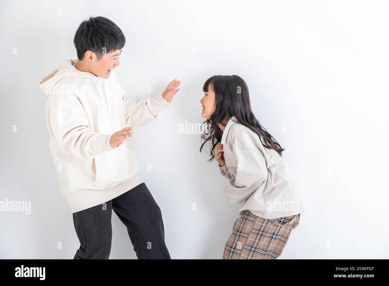 Children playing in a friendly manner Stock Photo - Alamy