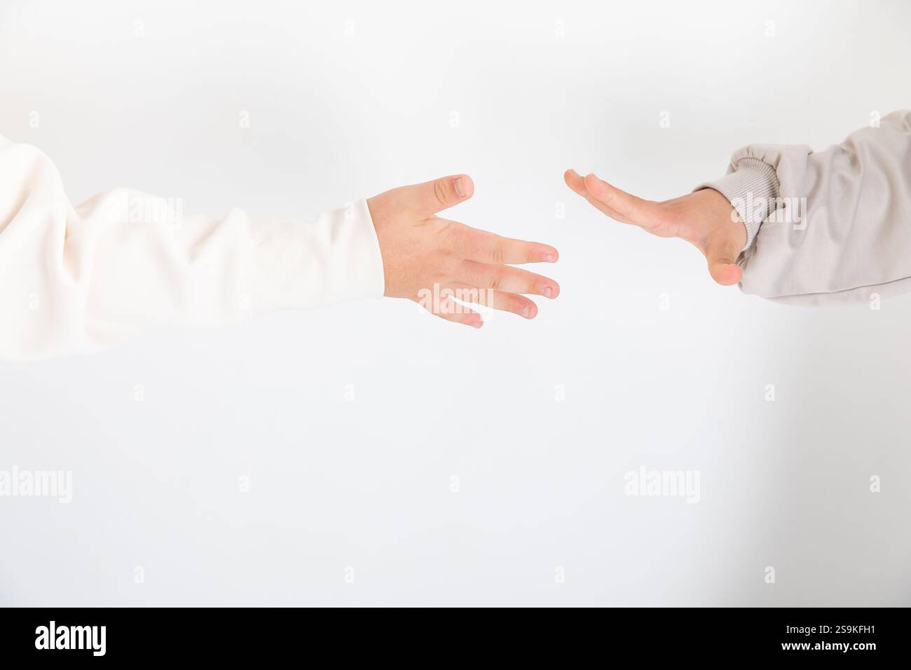 Children's hands playing rock-paper-scissors Stock Photo - Alamy