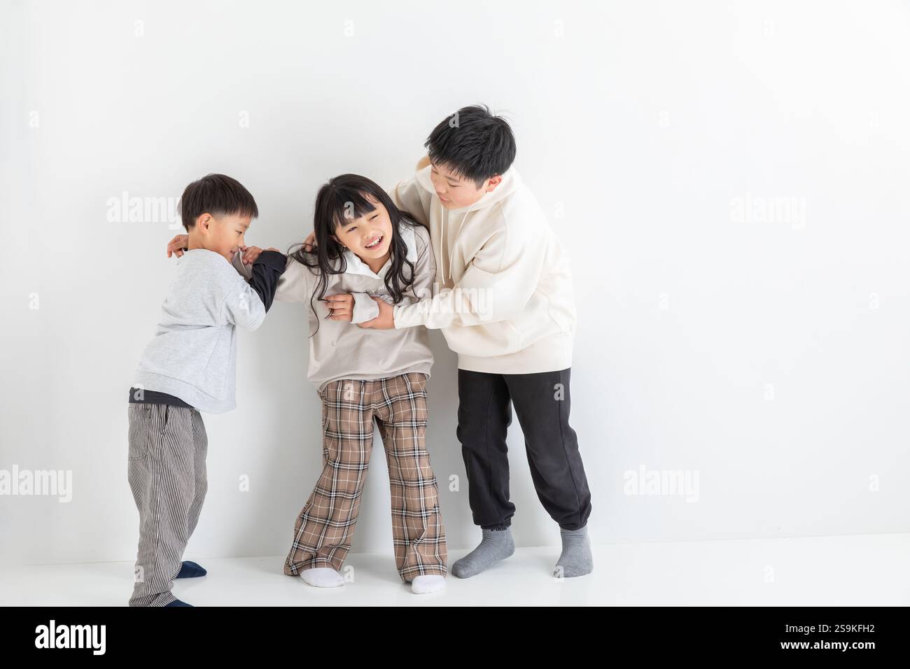 Siblings trouble hi-res stock photography and images - Alamy