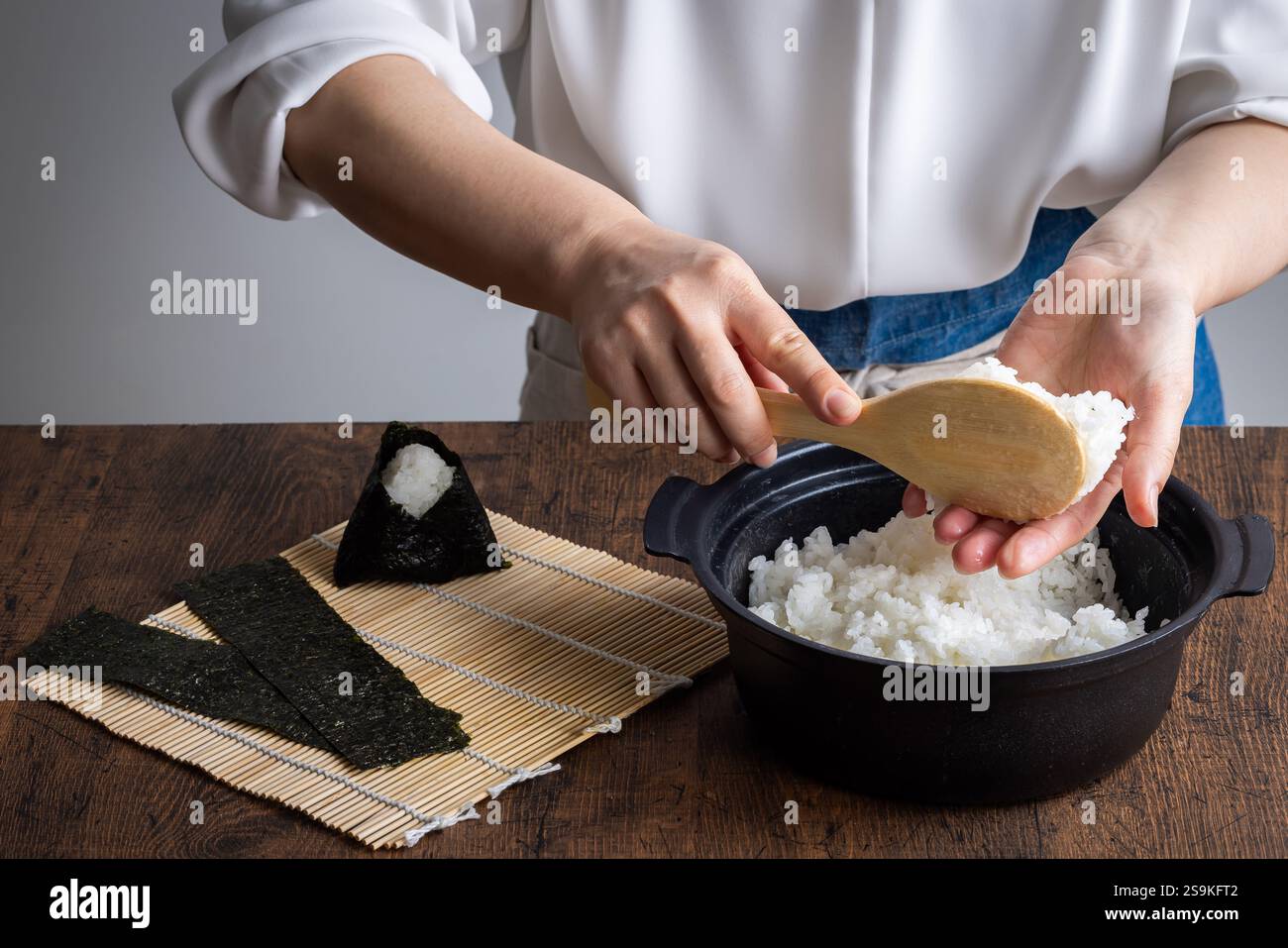 Hand making onigiri Japanese food Stock Photo - Alamy