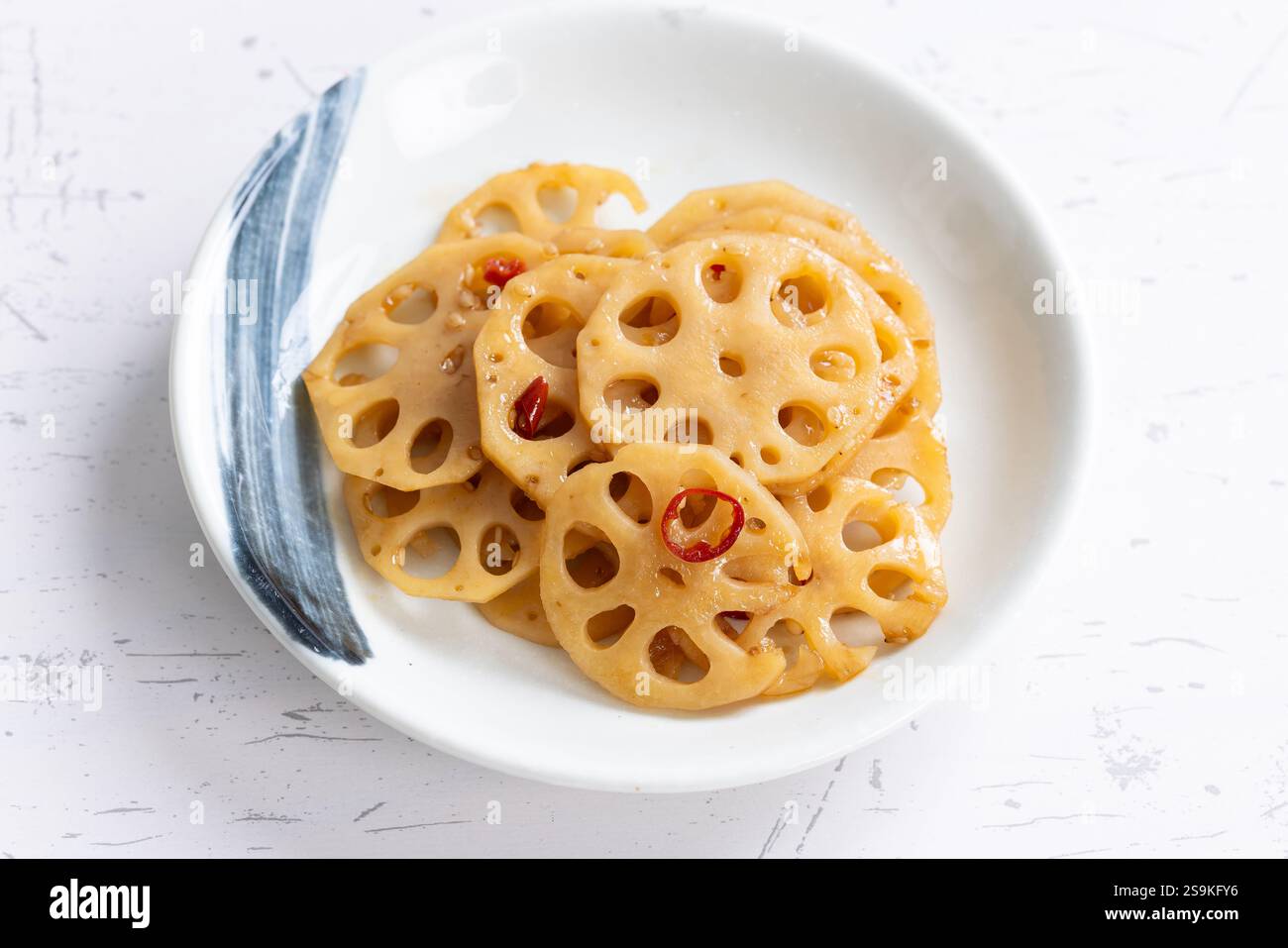 Sauteed lotus root kinpira Japanese food Stock Photo - Alamy