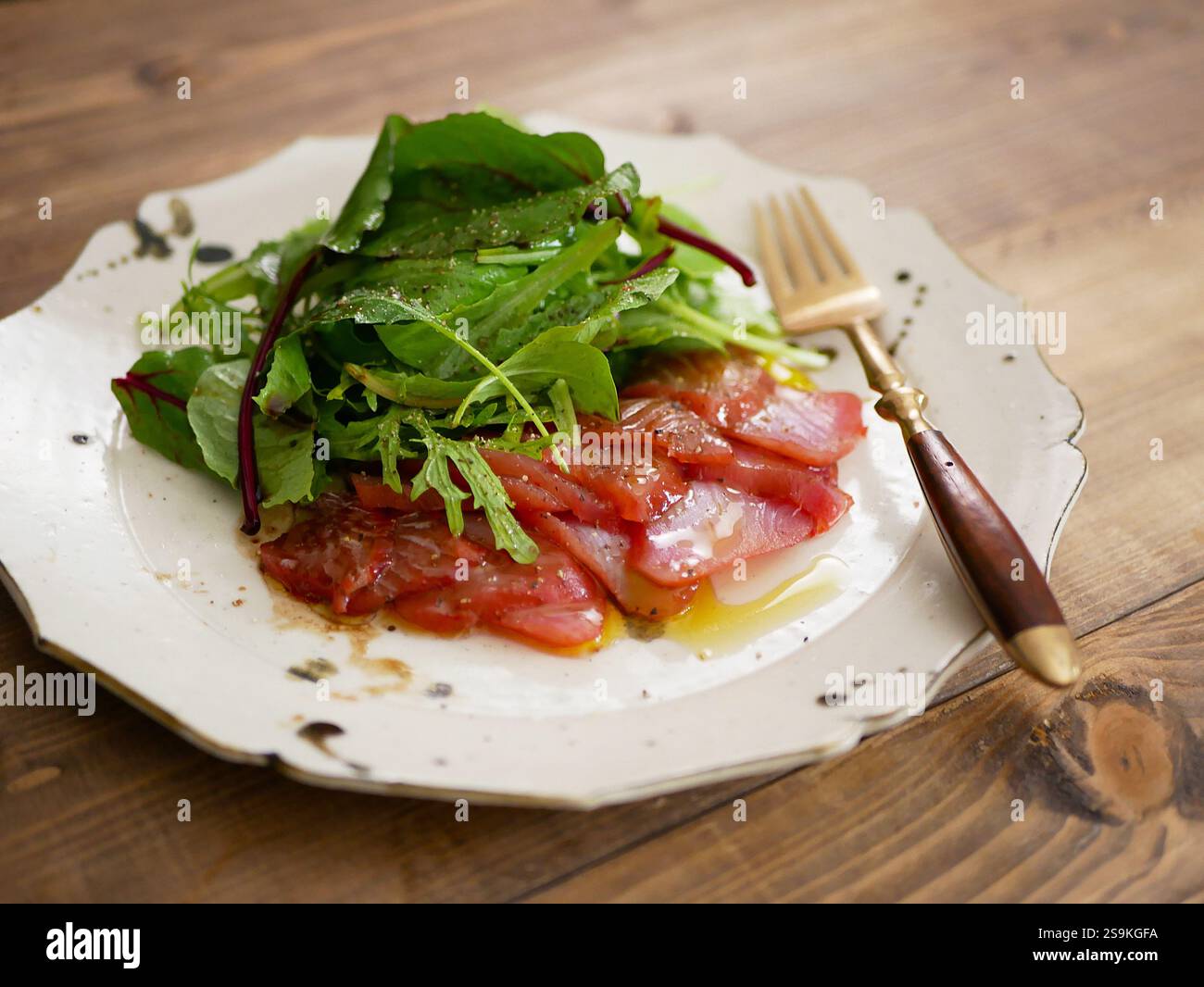 Carpaccio of tuna with prosciutto ham Stock Photo - Alamy