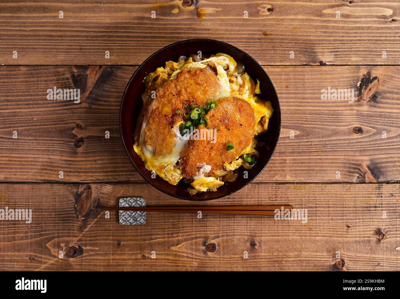 Korokke with egg and rice topped with shichimi Stock Photo - Alamy