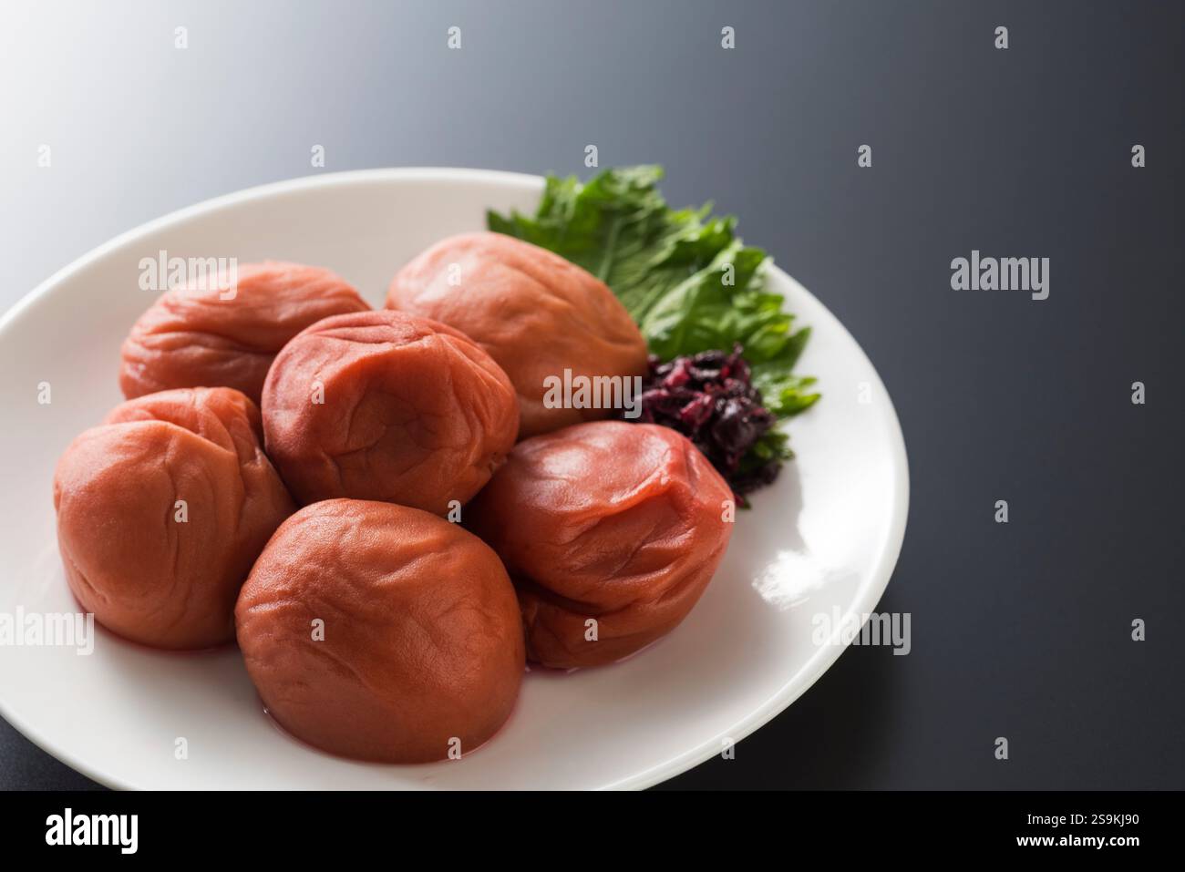 Umeboshi (pickled plums Stock Photo - Alamy