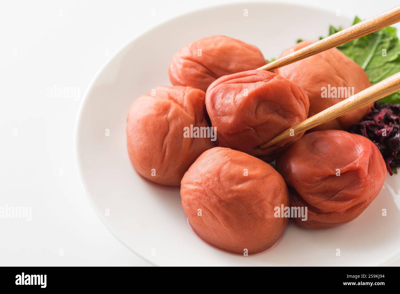 Umeboshi (pickled plums Stock Photo - Alamy