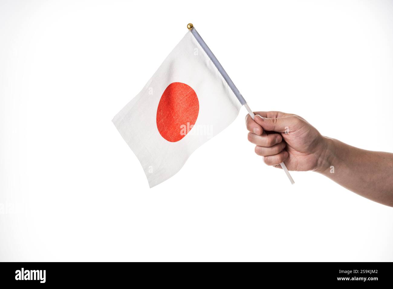 Hands holding national flags Stock Photo - Alamy