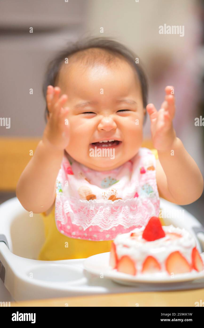 Child eating first birthday cake Stock Photo - Alamy
