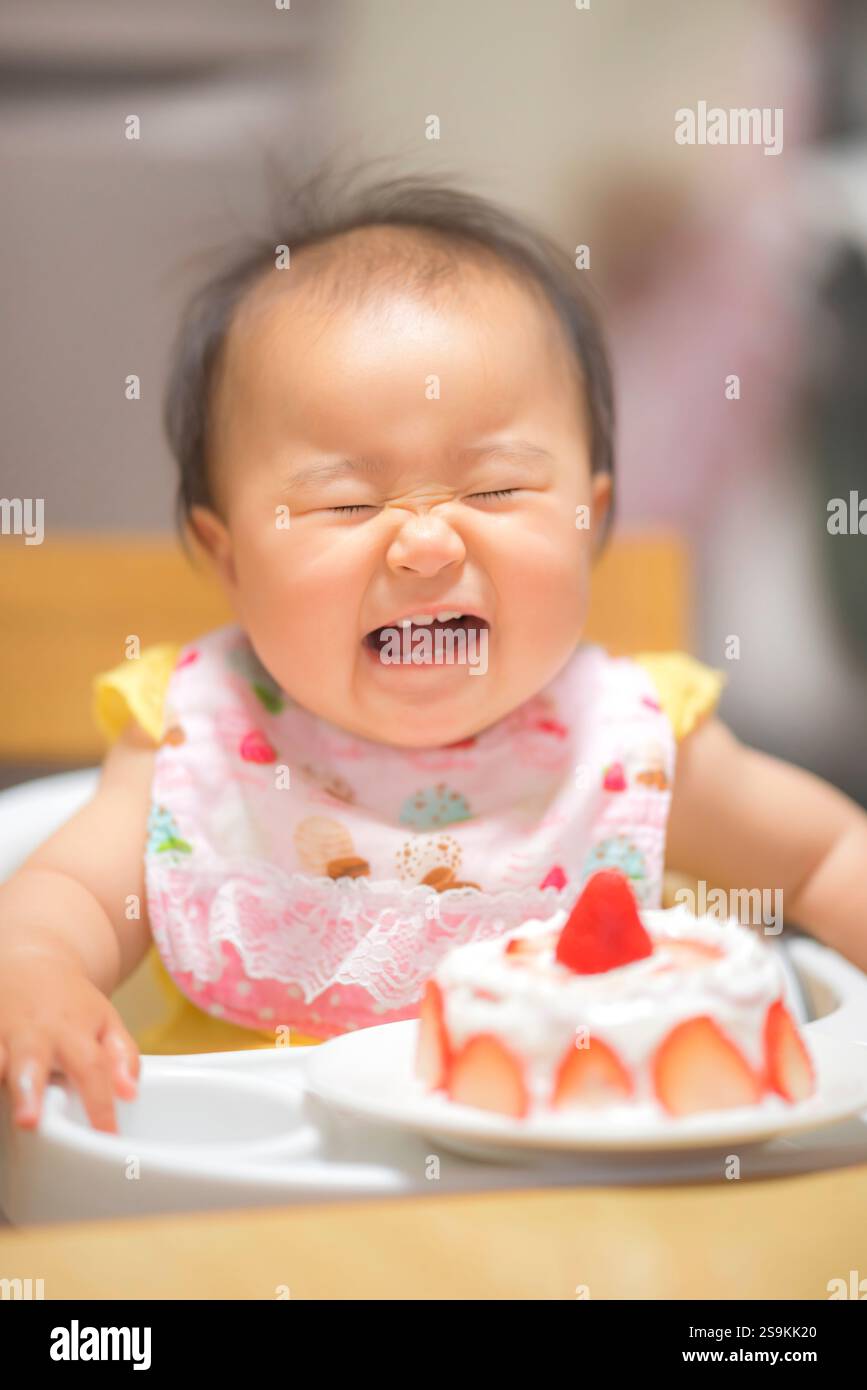 Child eating first birthday cake Stock Photo - Alamy