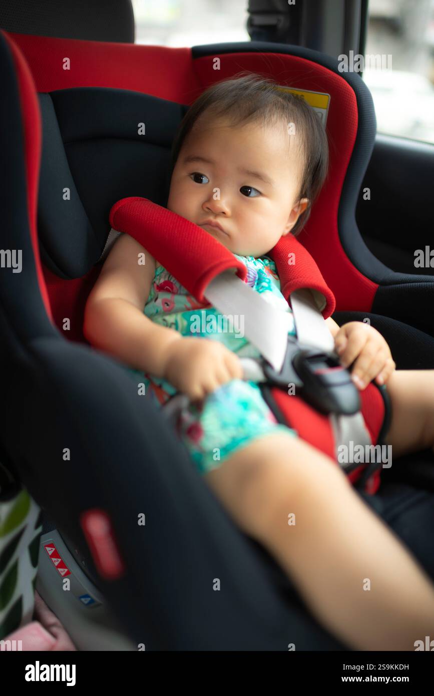 Baby in car seat Stock Photo - Alamy