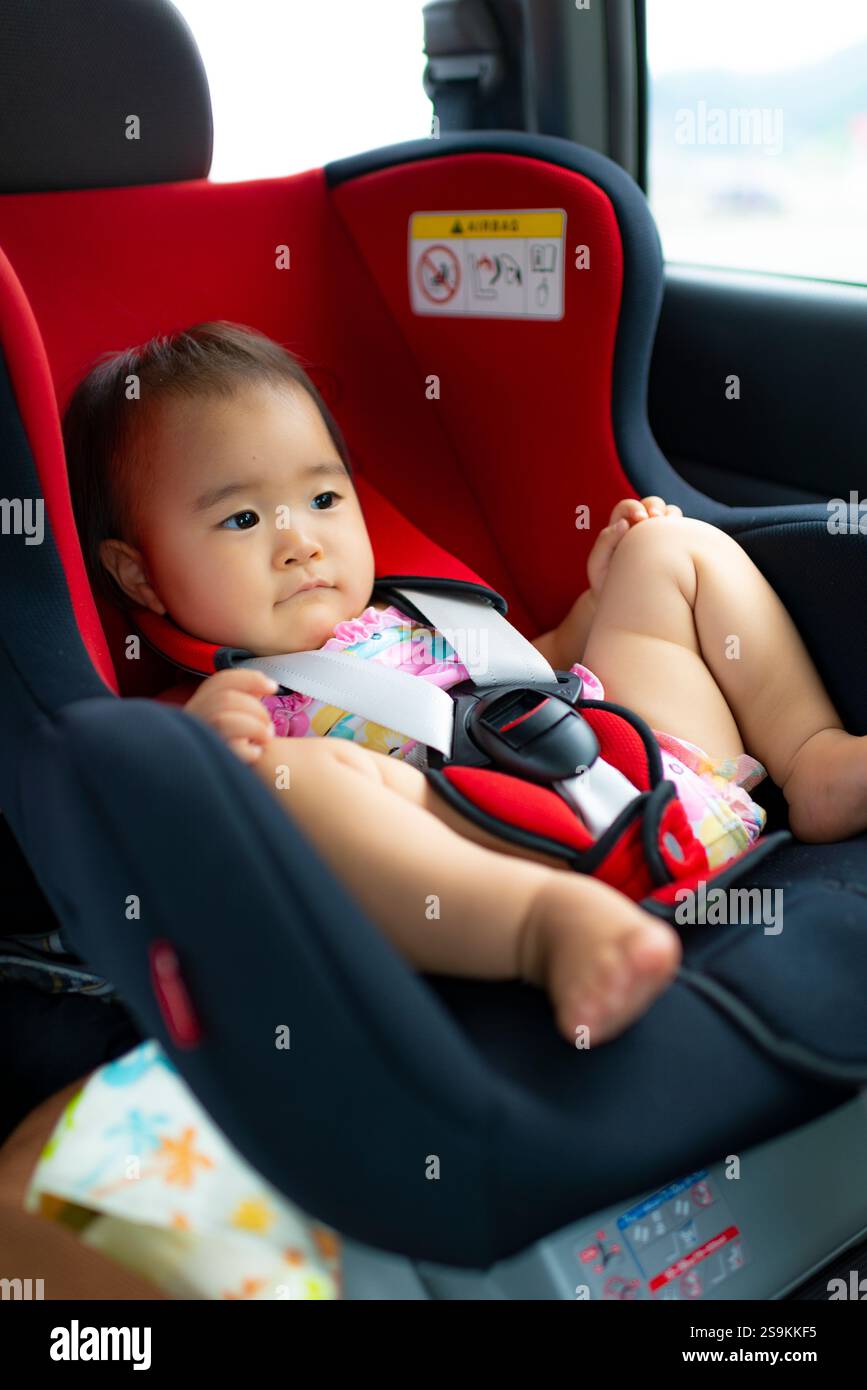 Baby in car seat Stock Photo - Alamy
