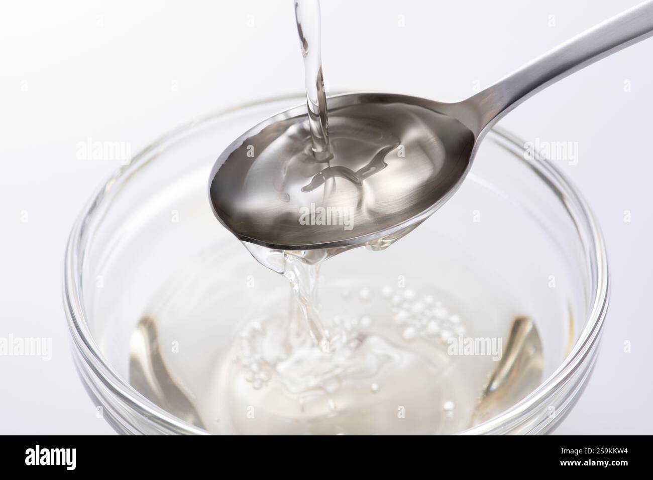 Scoop out the mirin Stock Photo - Alamy