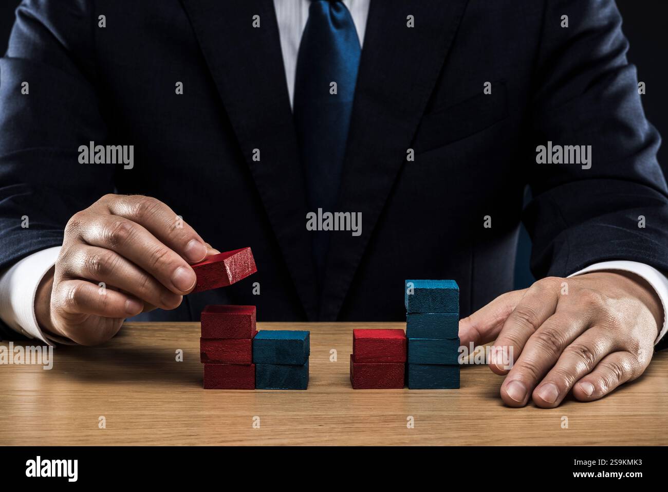 Stacking two blocks hi-res stock photography and images - Alamy