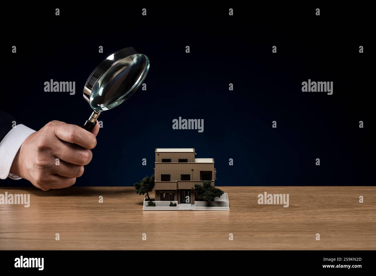 Model houses Lupe Examine Stock Photo - Alamy