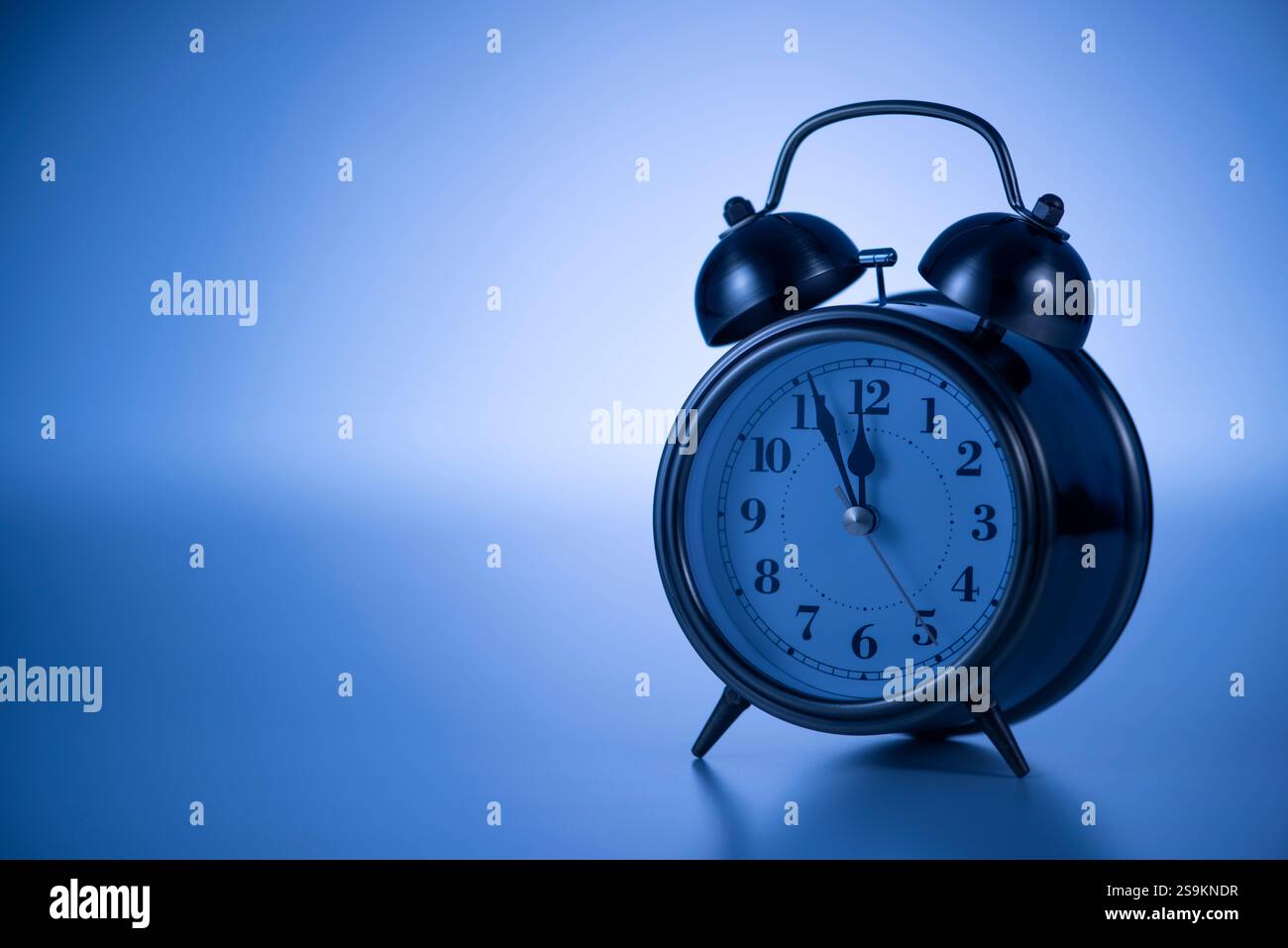 Alarm clock midnight Stock Photo - Alamy