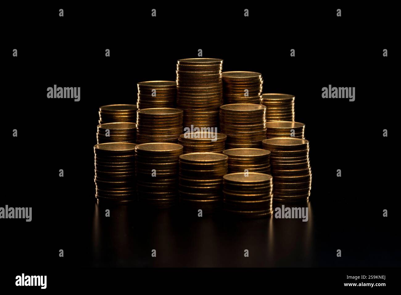 Piles of gold coins Stock Photo - Alamy