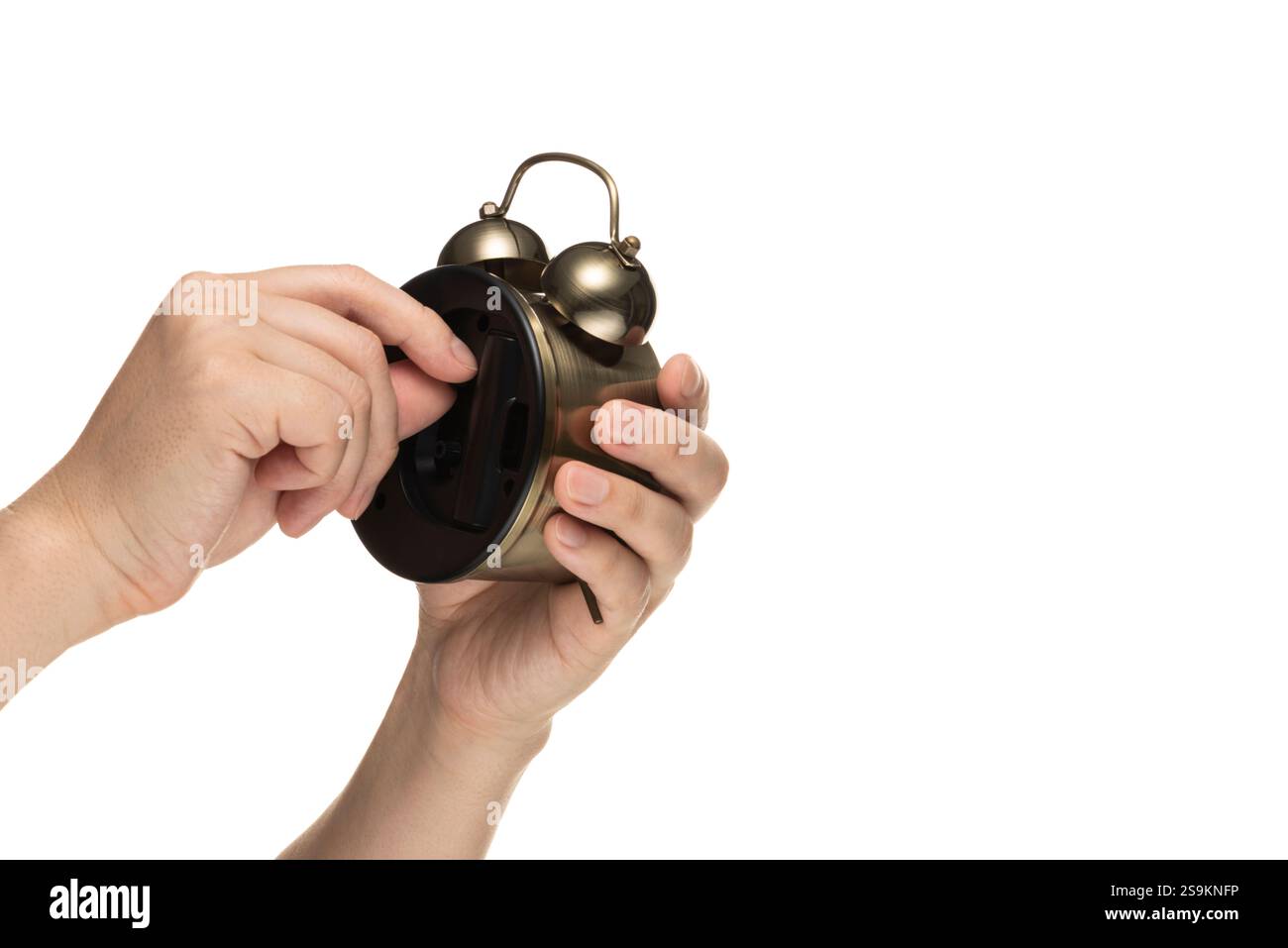 Setting an alarm clock Stock Photo - Alamy