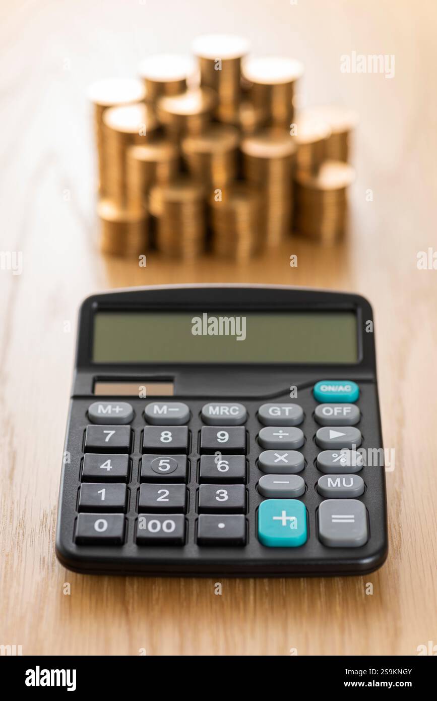 Money and calculators Stock Photo - Alamy
