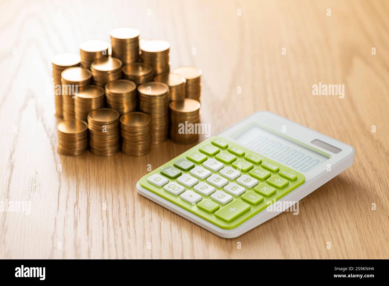 Money and calculators Stock Photo - Alamy