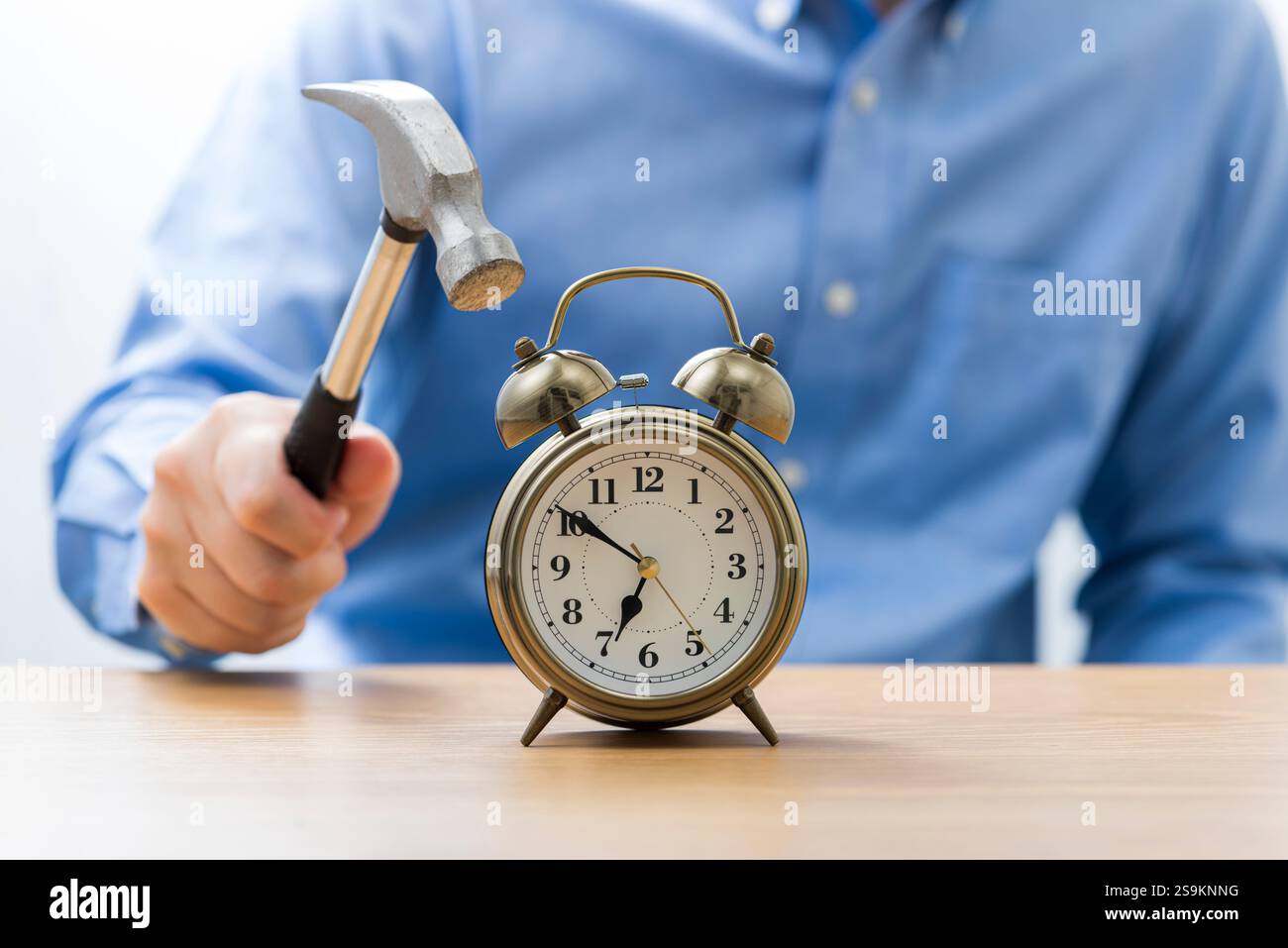 smashing an alarm clock Stock Photo - Alamy
