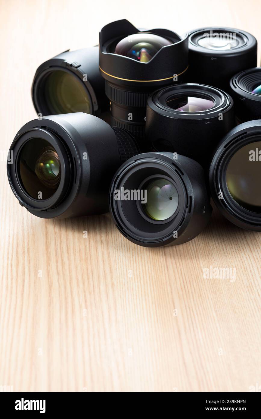 Lots of photographic lenses on the desk Stock Photo - Alamy
