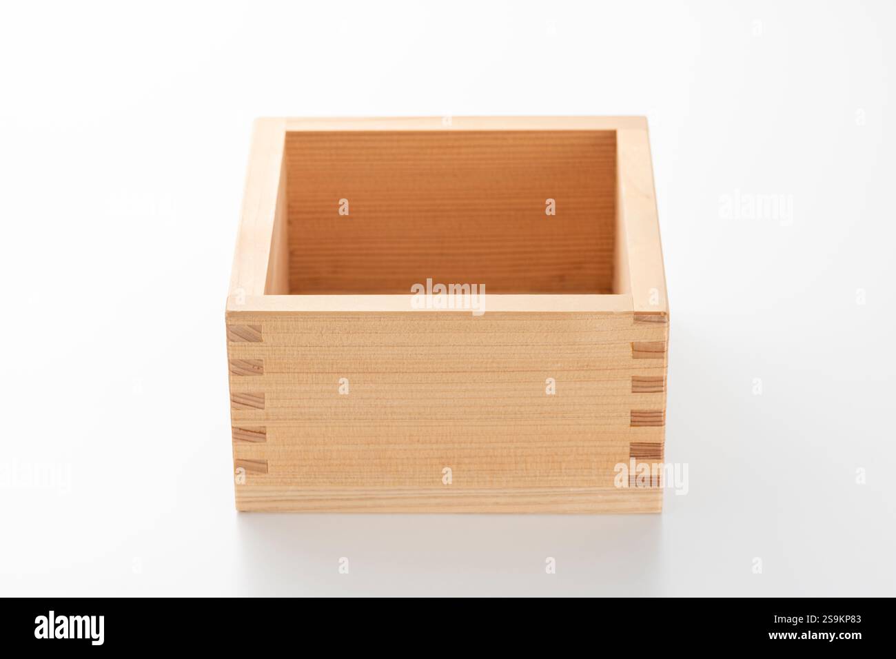 Wooden Masu Masu on white background Stock Photo - Alamy