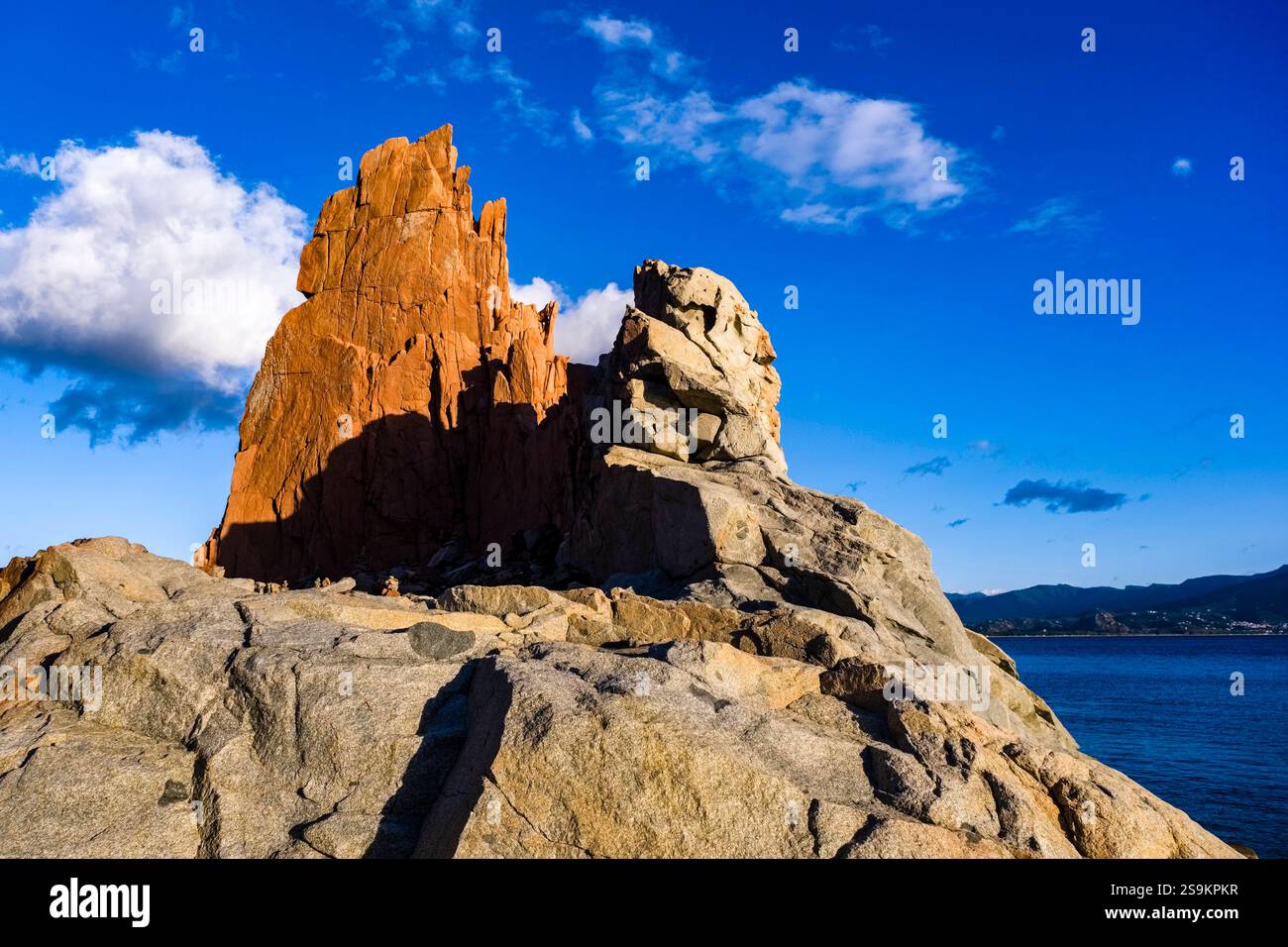 The blood-red porphyry peaks of Arbatax, Rocce Rosse, which rise out of ...